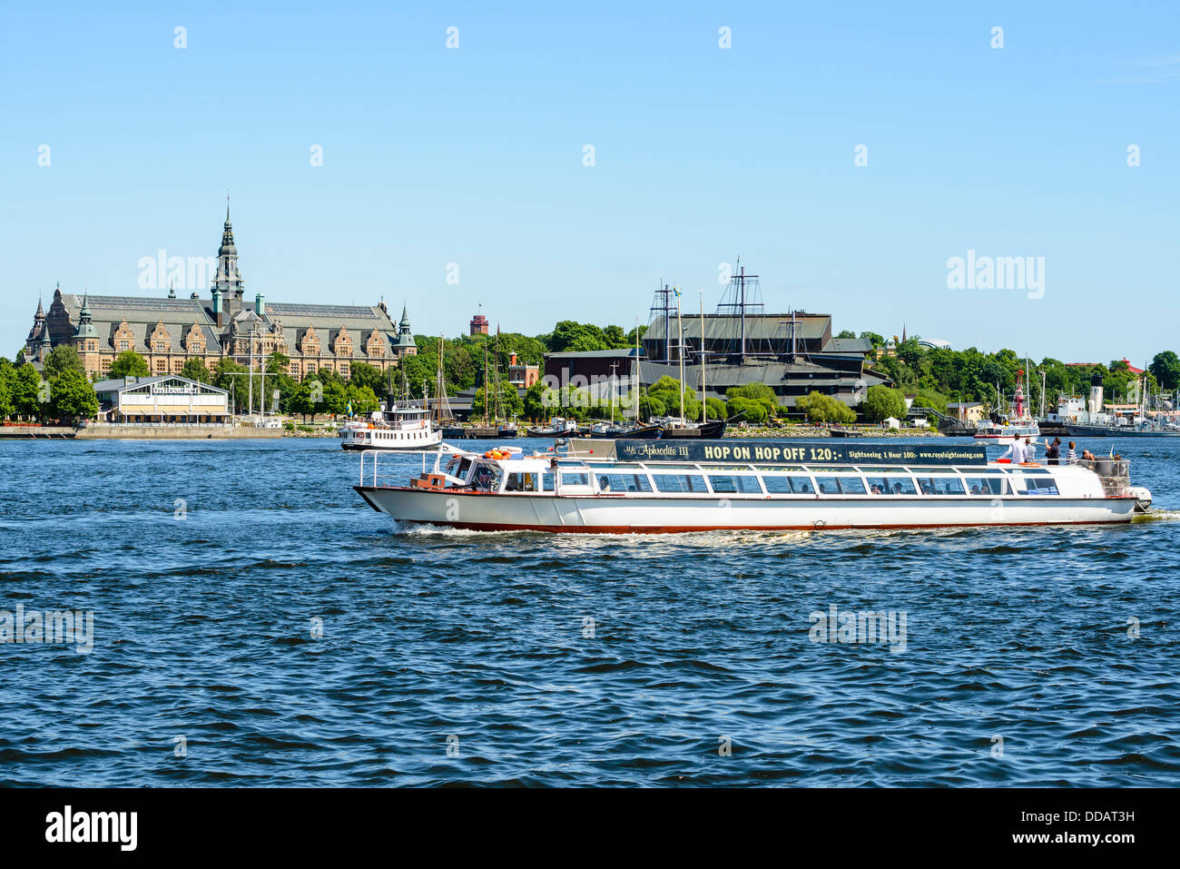 Sightseeing boat at Nybroviken Stockholm Sweden with Djurgården museums ...
