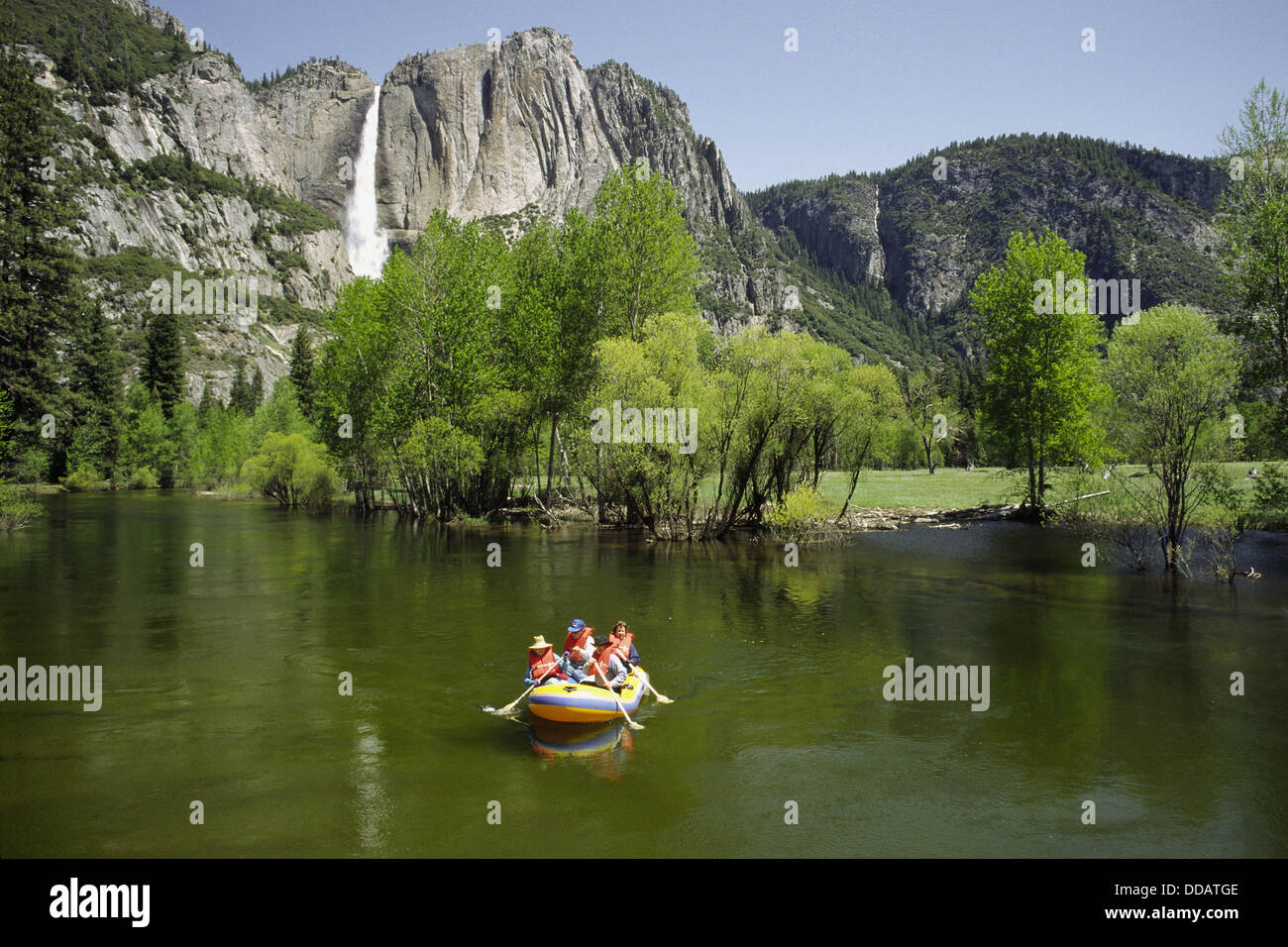 Rafting along the Merced River with the Upper Yosemite Falls in ...