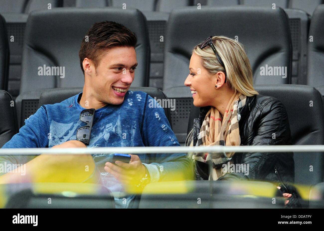 Czech forward Vaclav Kadlec of Frankfurt talks to his girlfriend Renata ...