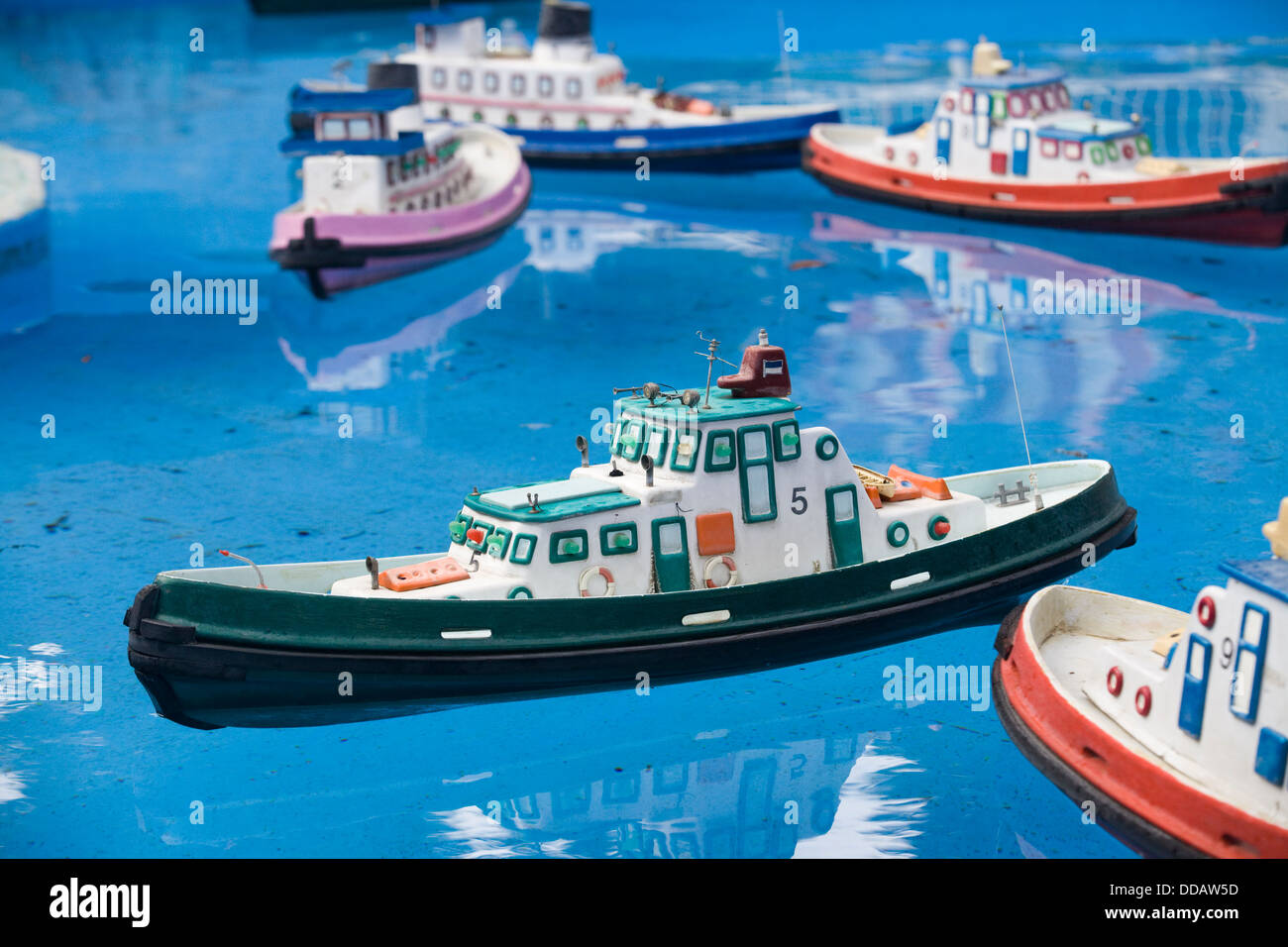 Remote control Mini Ships on a pond of water Stock Photo - Alamy
