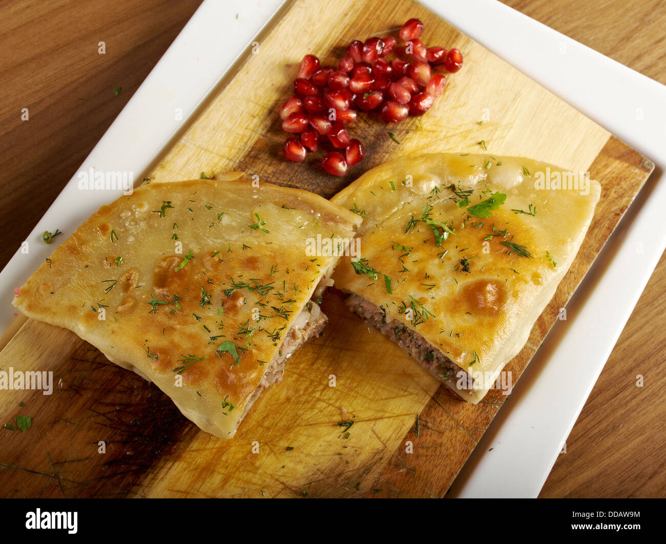 Qutab- baked Chebureki traditional georgian meat pastry.meat in a pitta ...