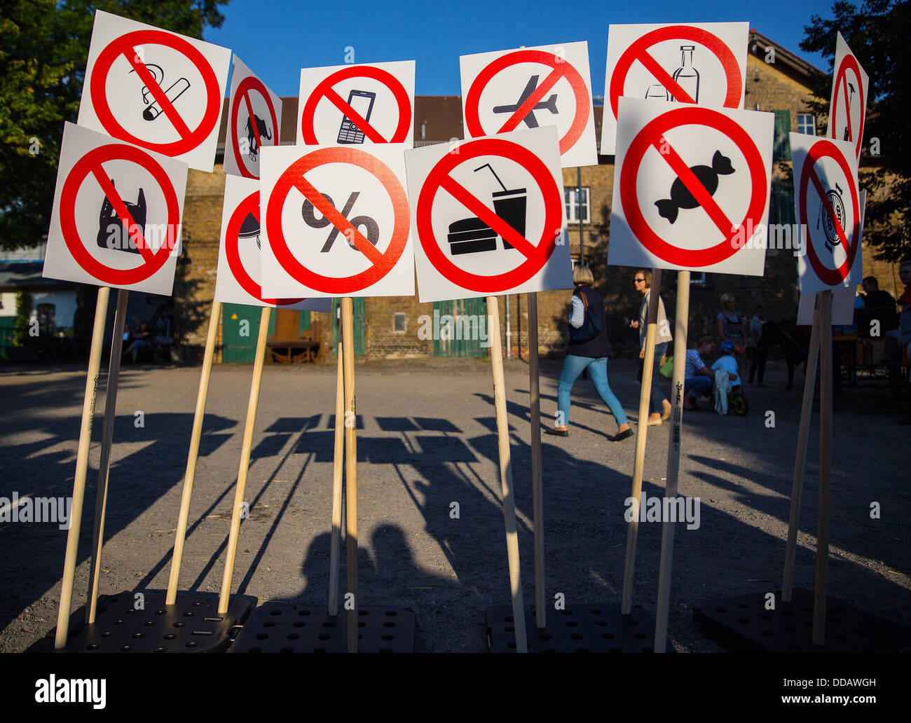 Berlin, Germany. 28th Aug, 2013. Ironic prohibition signs are seen ...