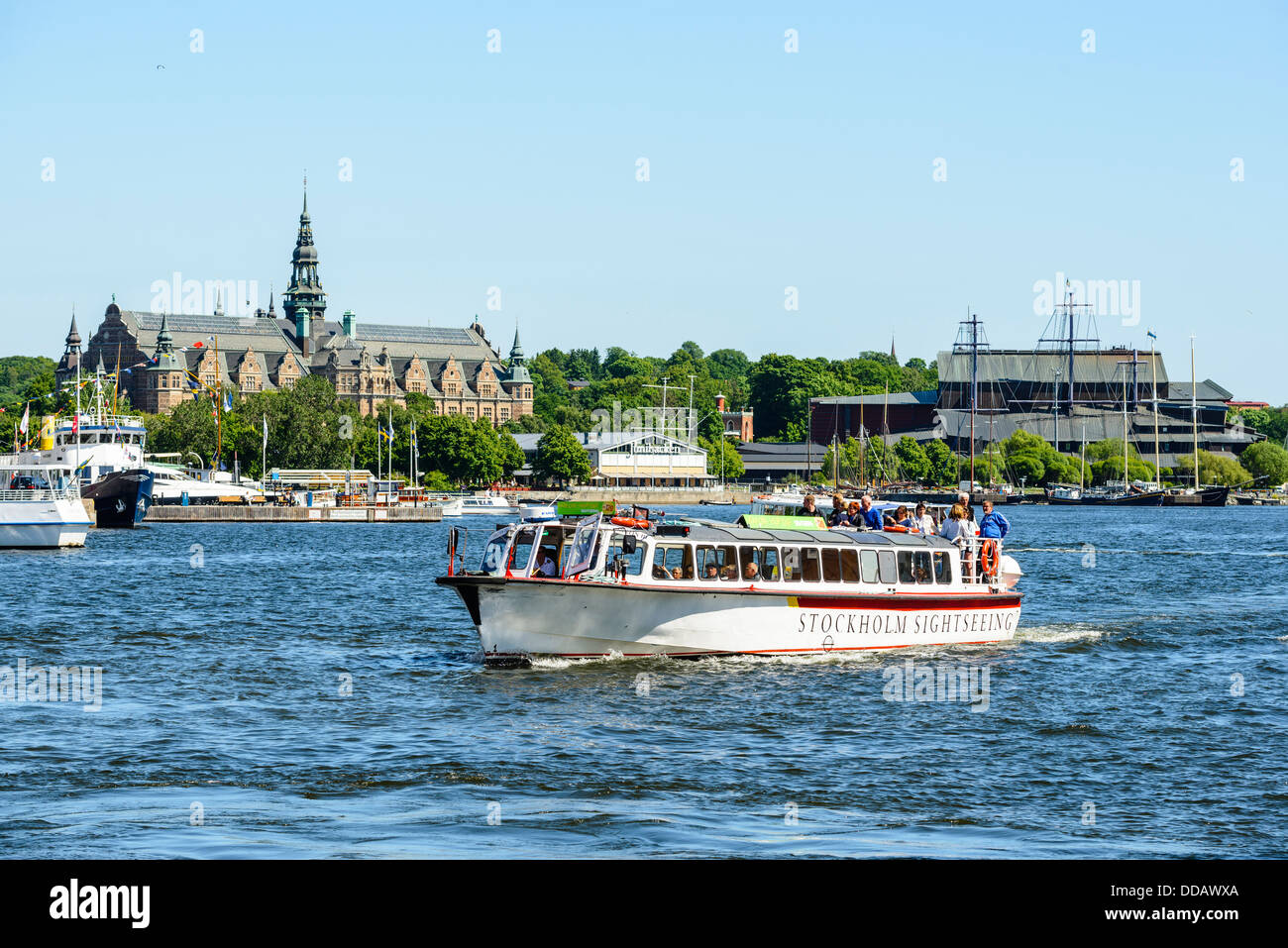 Sightseeing boat at Nybroviken Stockholm Sweden with Djurgården museums ...
