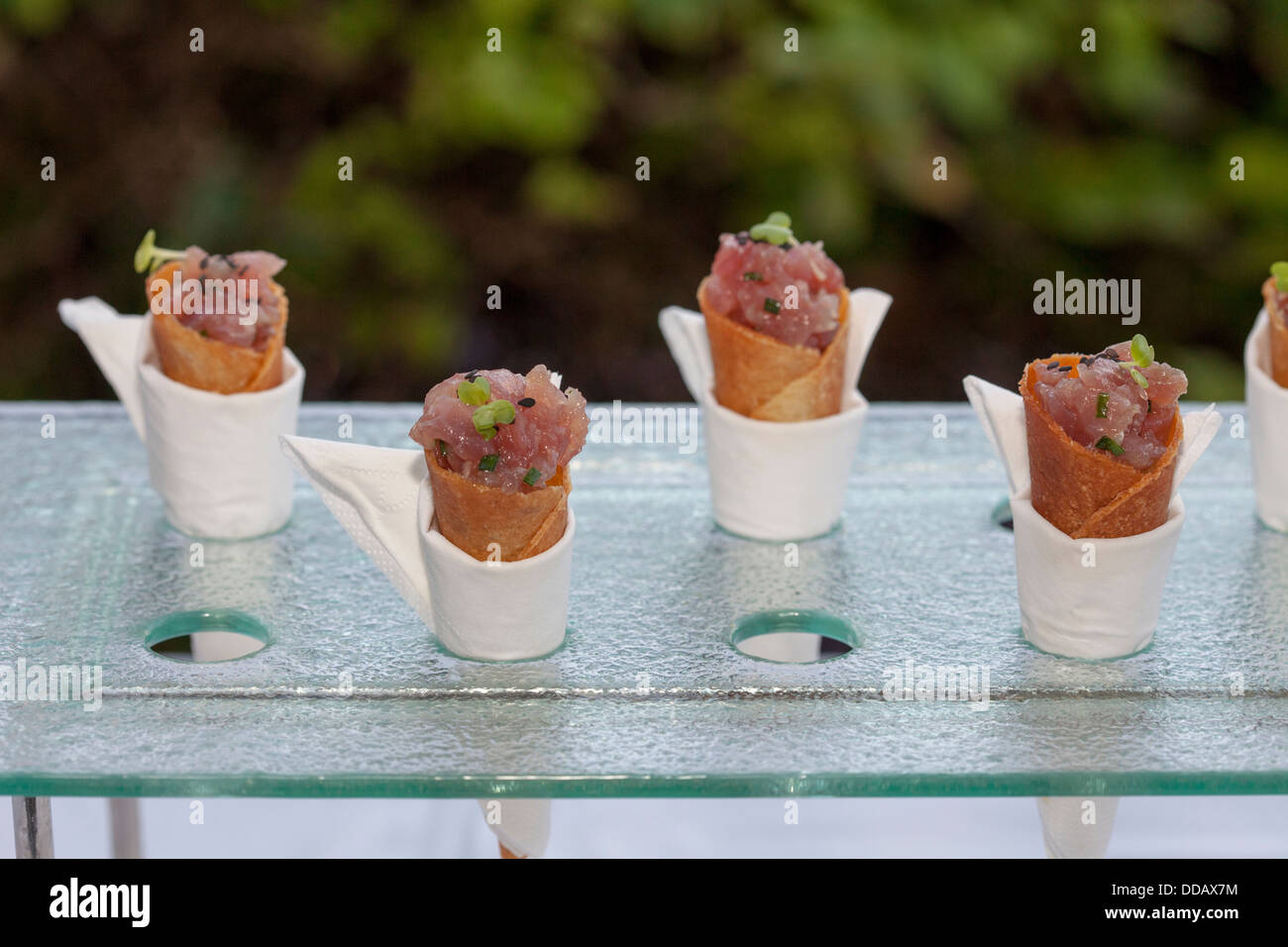 exotic type of design fingerfood based on roasted bread leaf and meat ...