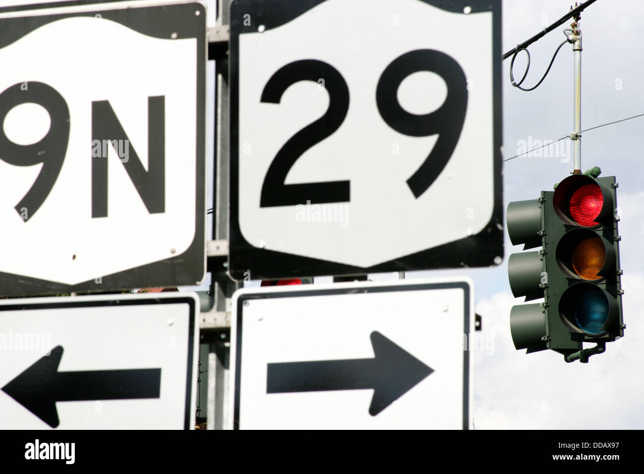 Highway direction signs and traffic light in New York, USA Stock Photo ...