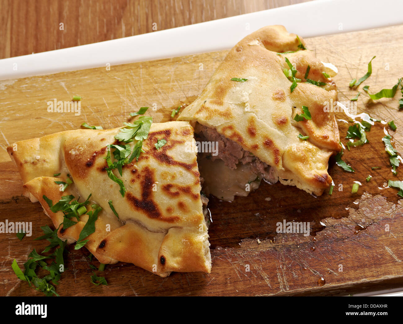 Qutab- baked Chebureki traditional georgian meat pastry.meat in a pitta ...