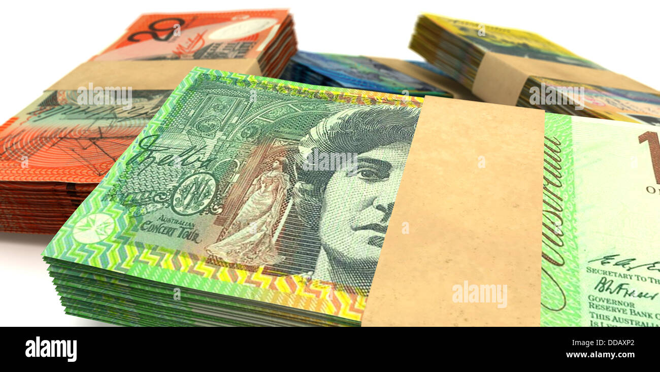A scattered pile of australian dollar bank notes bundled into value ...