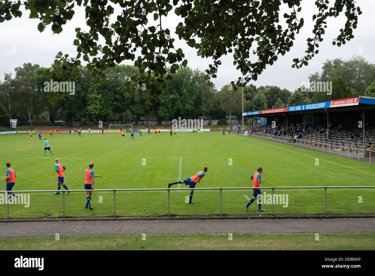 TuRU 1880 Dusseldorf football club Substitutes warming-up during a game ...