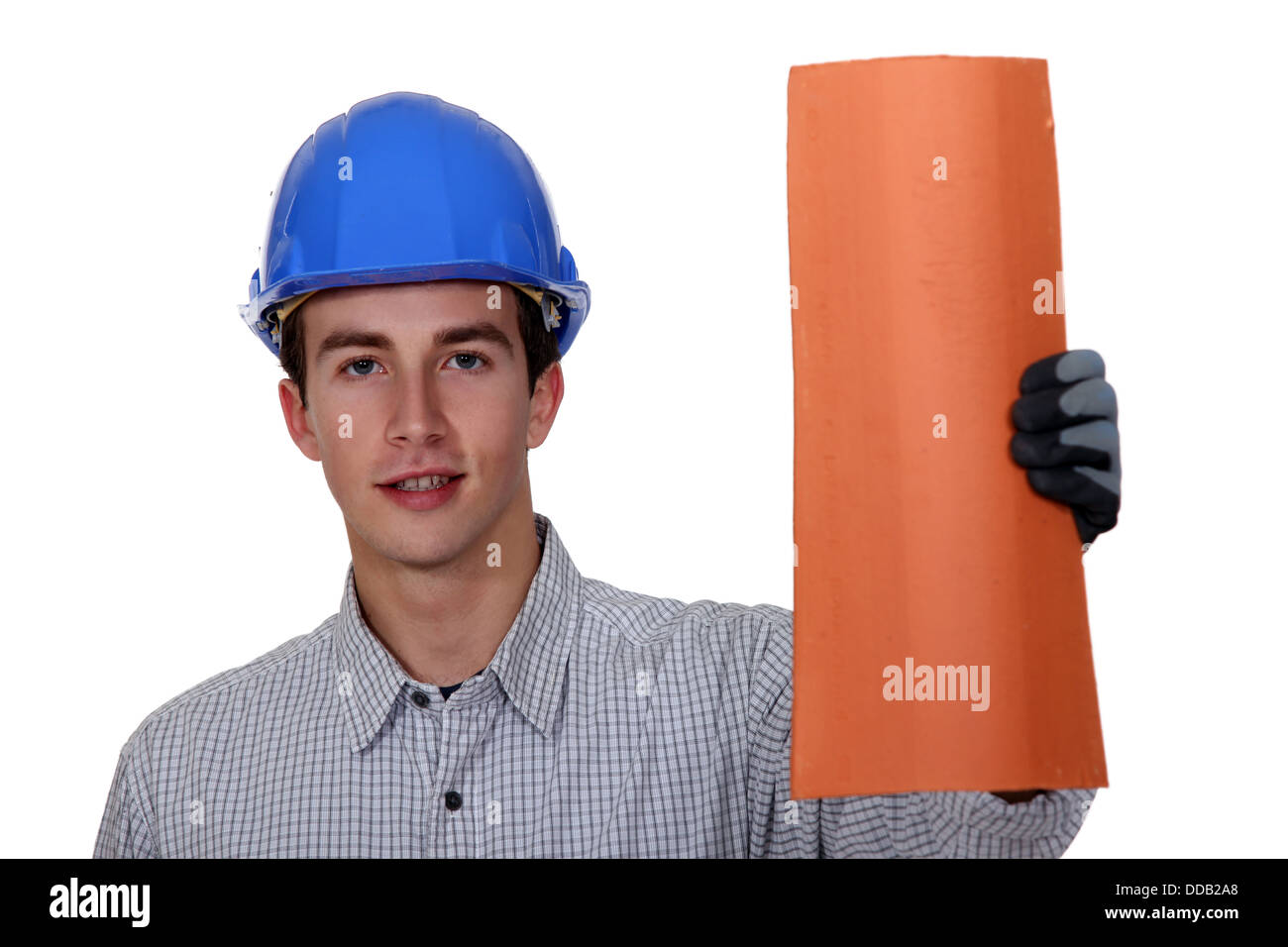 Roofer showing tile Stock Photo - Alamy