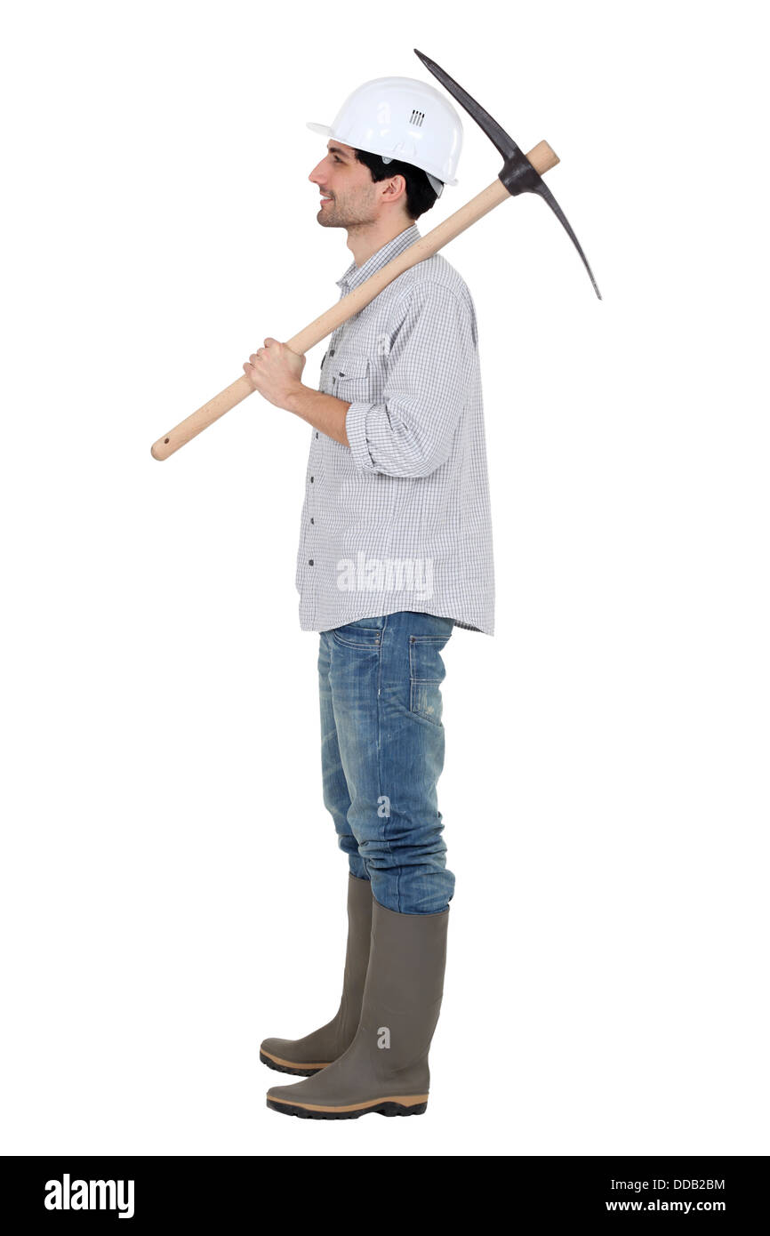 Man with a pickaxe Stock Photo - Alamy