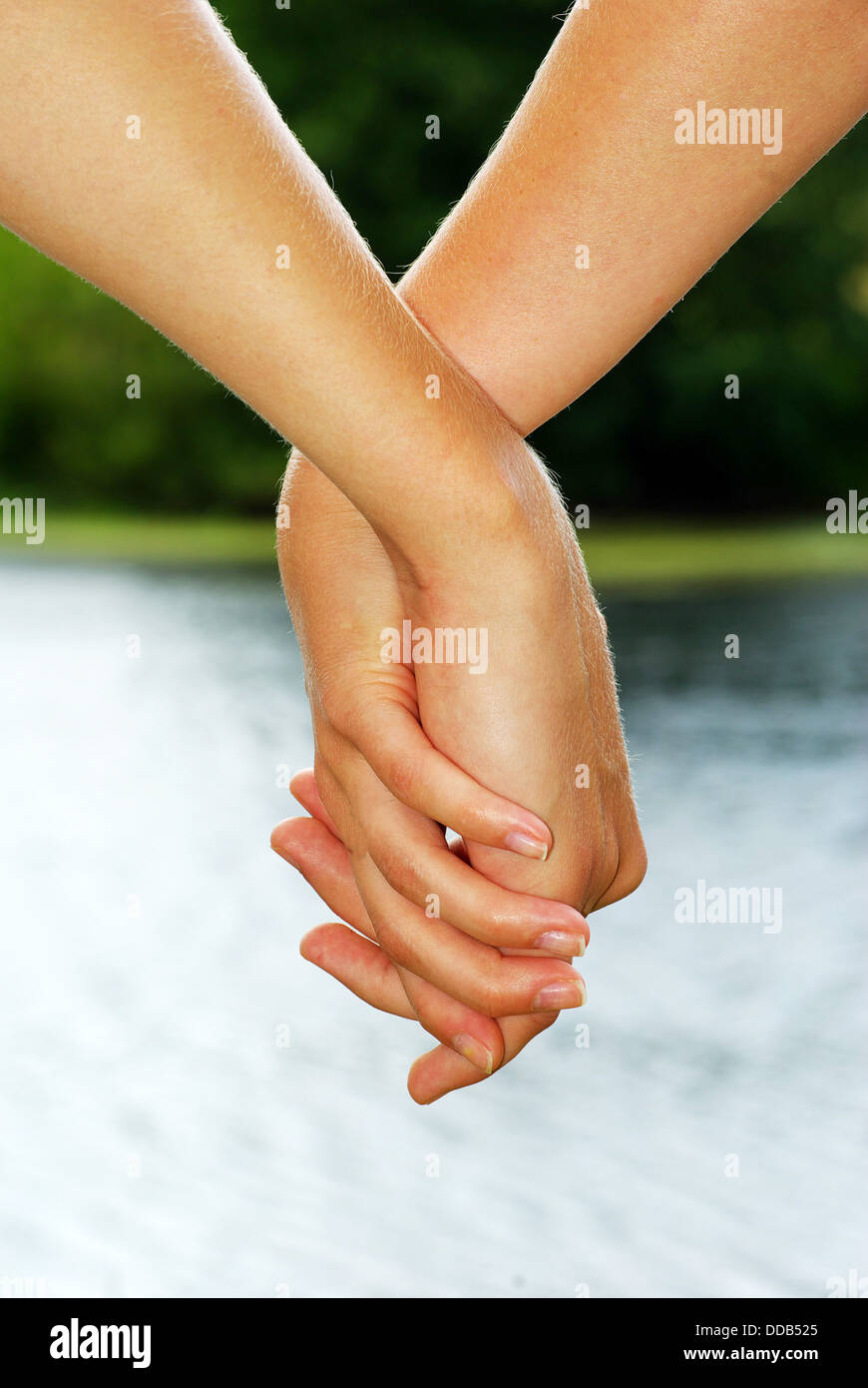 hand in a hand Stock Photo - Alamy