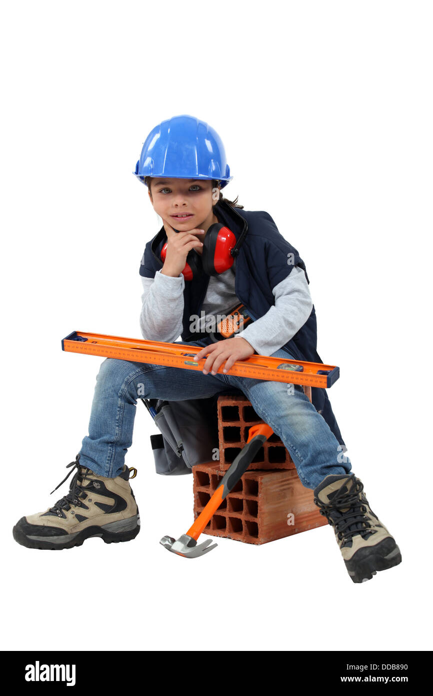 Child dressed as a builder Stock Photo - Alamy
