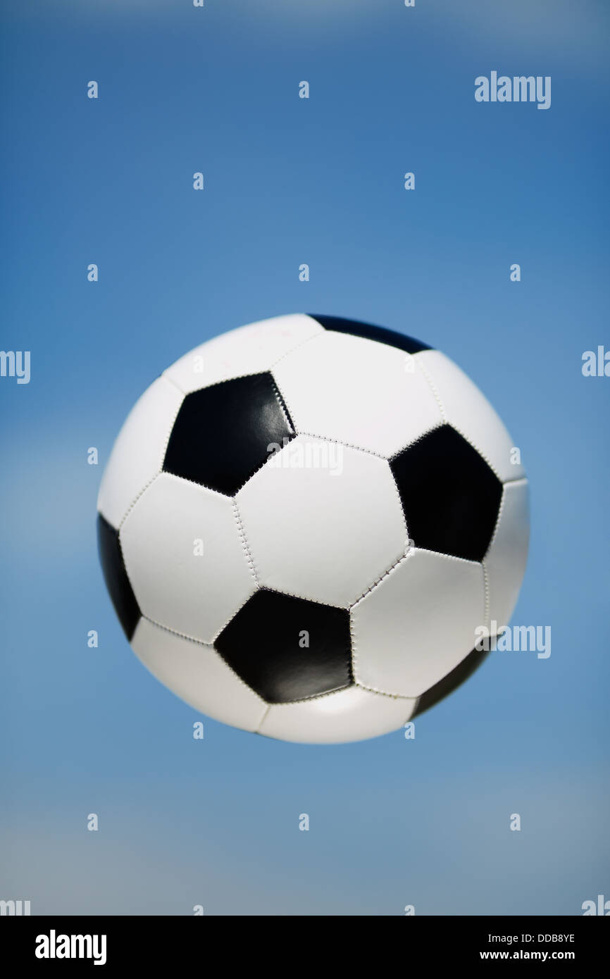 Soccer ball in the air Stock Photo - Alamy