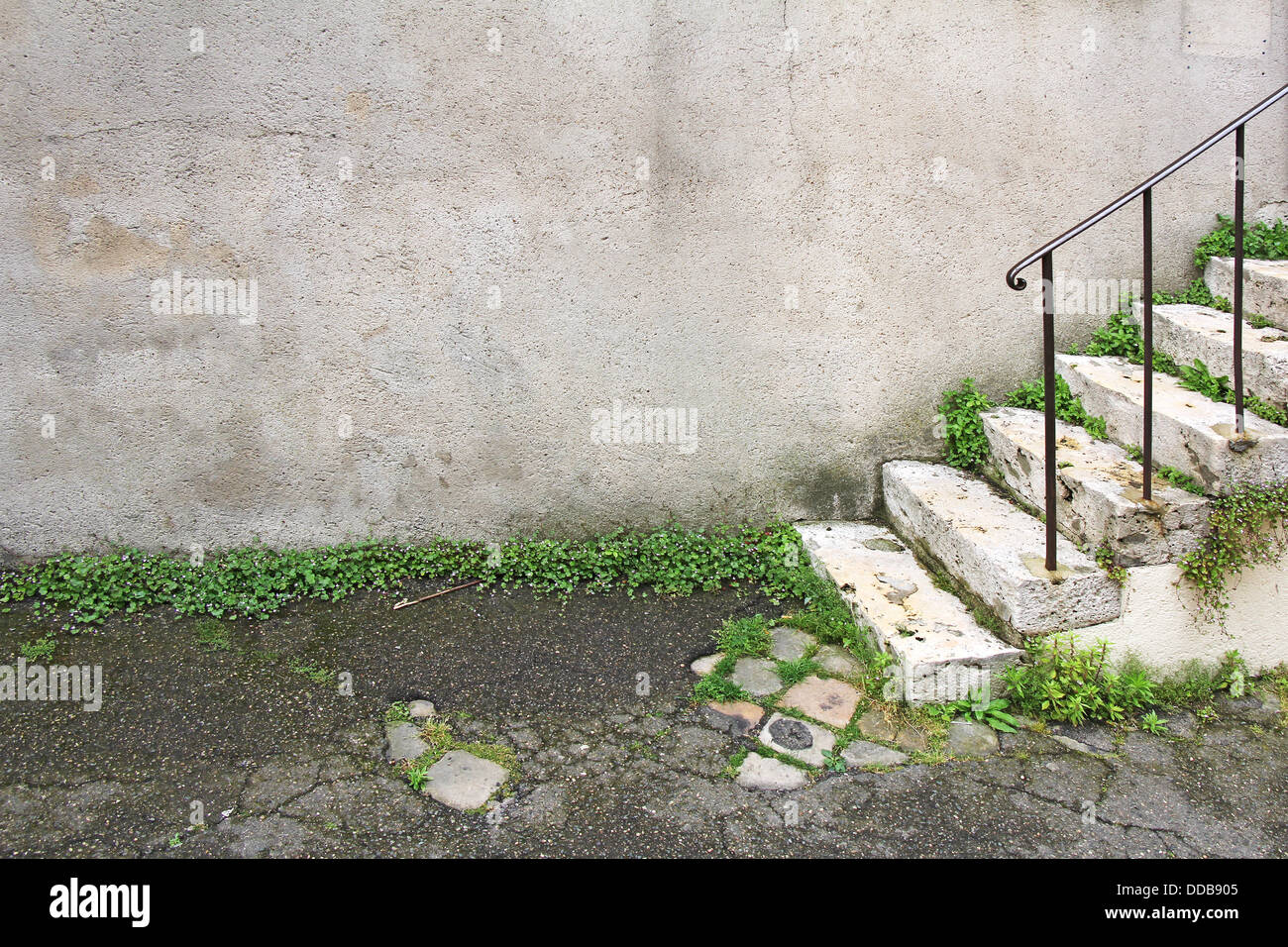 Old damaged stone staircase and old damaged wall Stock Photo - Alamy
