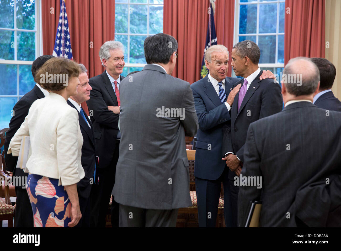 US President Barack Obama listens to Vice President Joe Biden following ...
