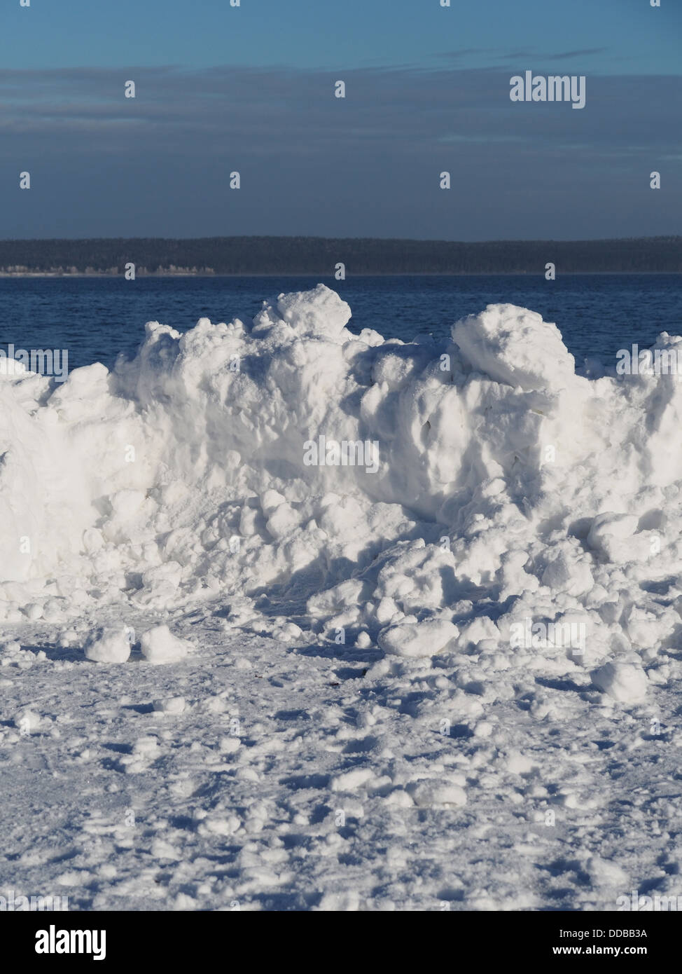 Snowdrift on the lake Stock Photo - Alamy