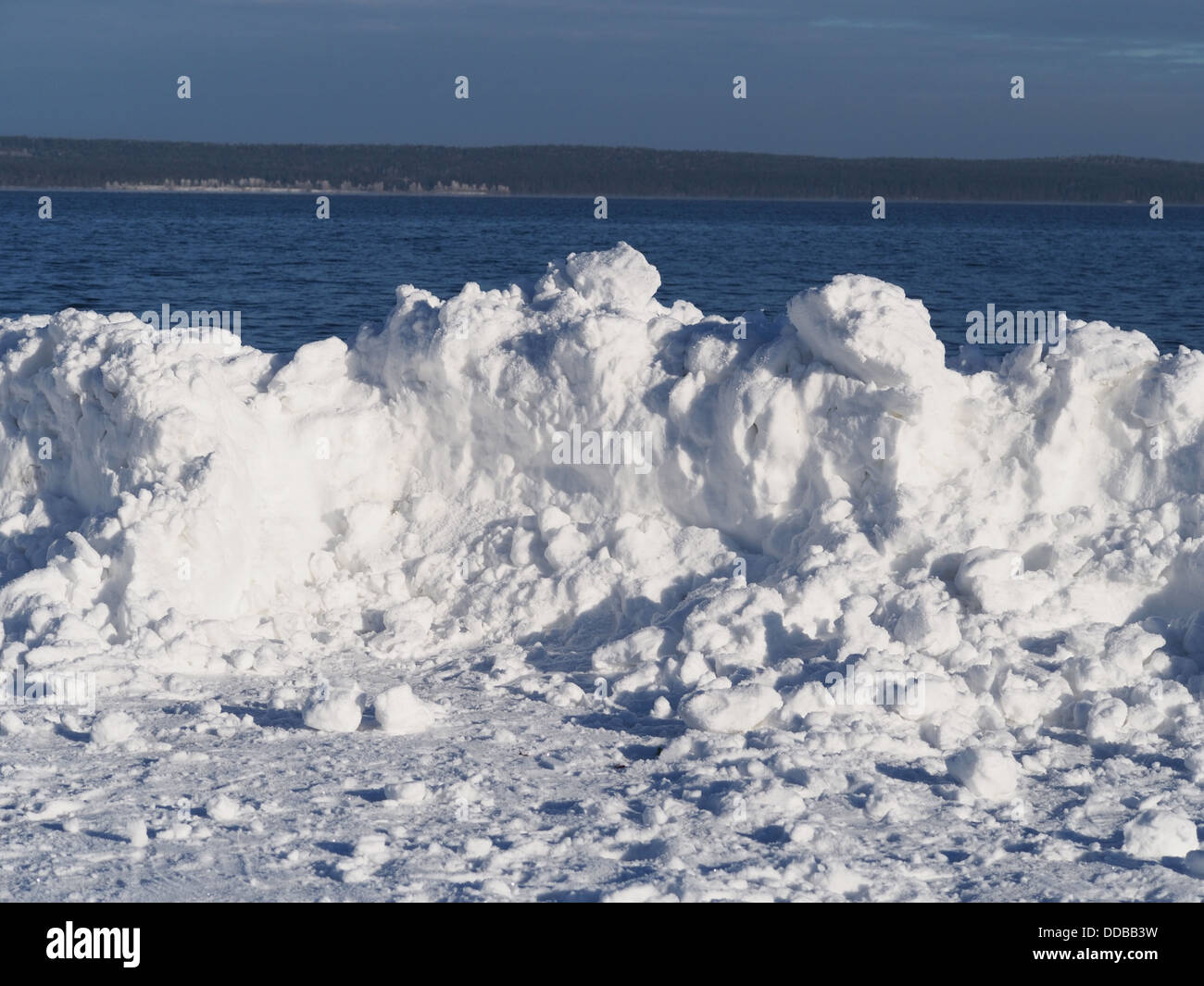 Snowdrift on the lake Stock Photo - Alamy