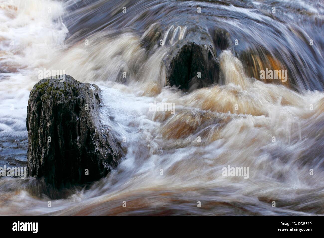 Water Swirling Around Rocks
