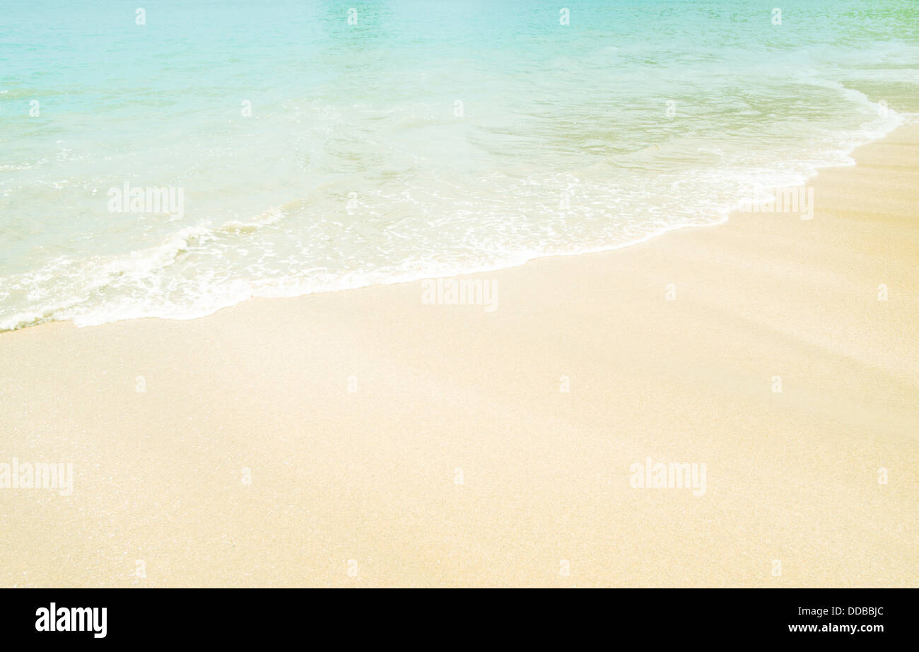 Sand beach water background Stock Photo - Alamy