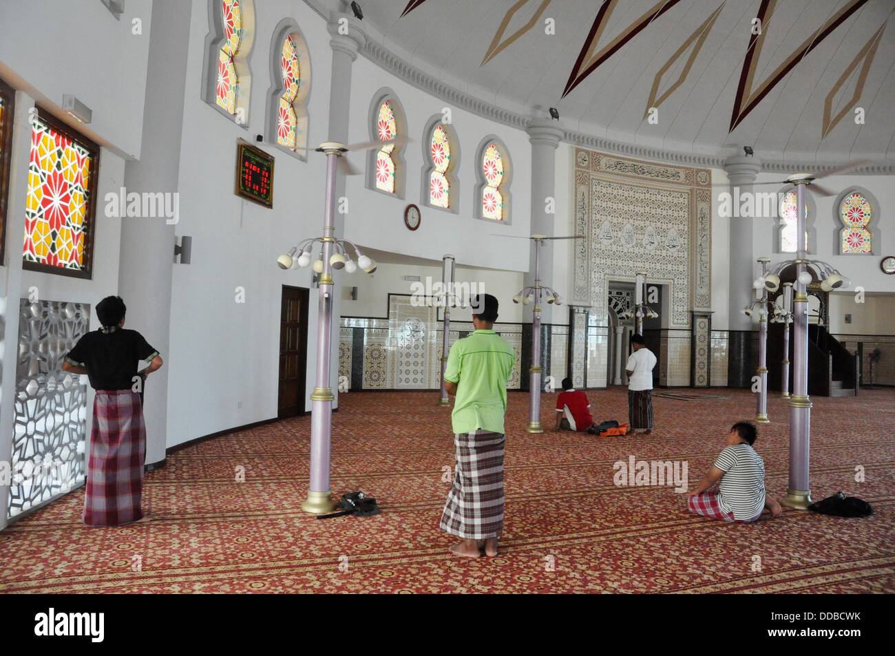 George Town, Penang (Malaysia): some men praying at the Floating Mosque ...