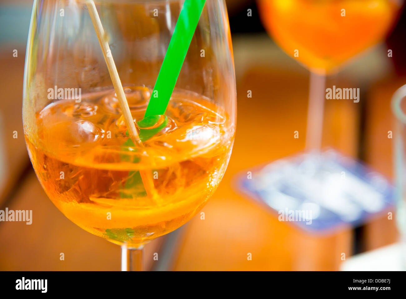 Alcoholic summer night drinks with ice cubes Stock Photo - Alamy