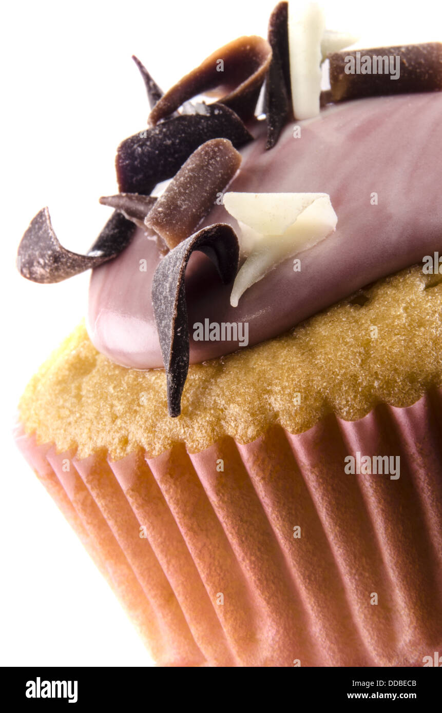cupcake with icing and chocolate curls Stock Photo - Alamy
