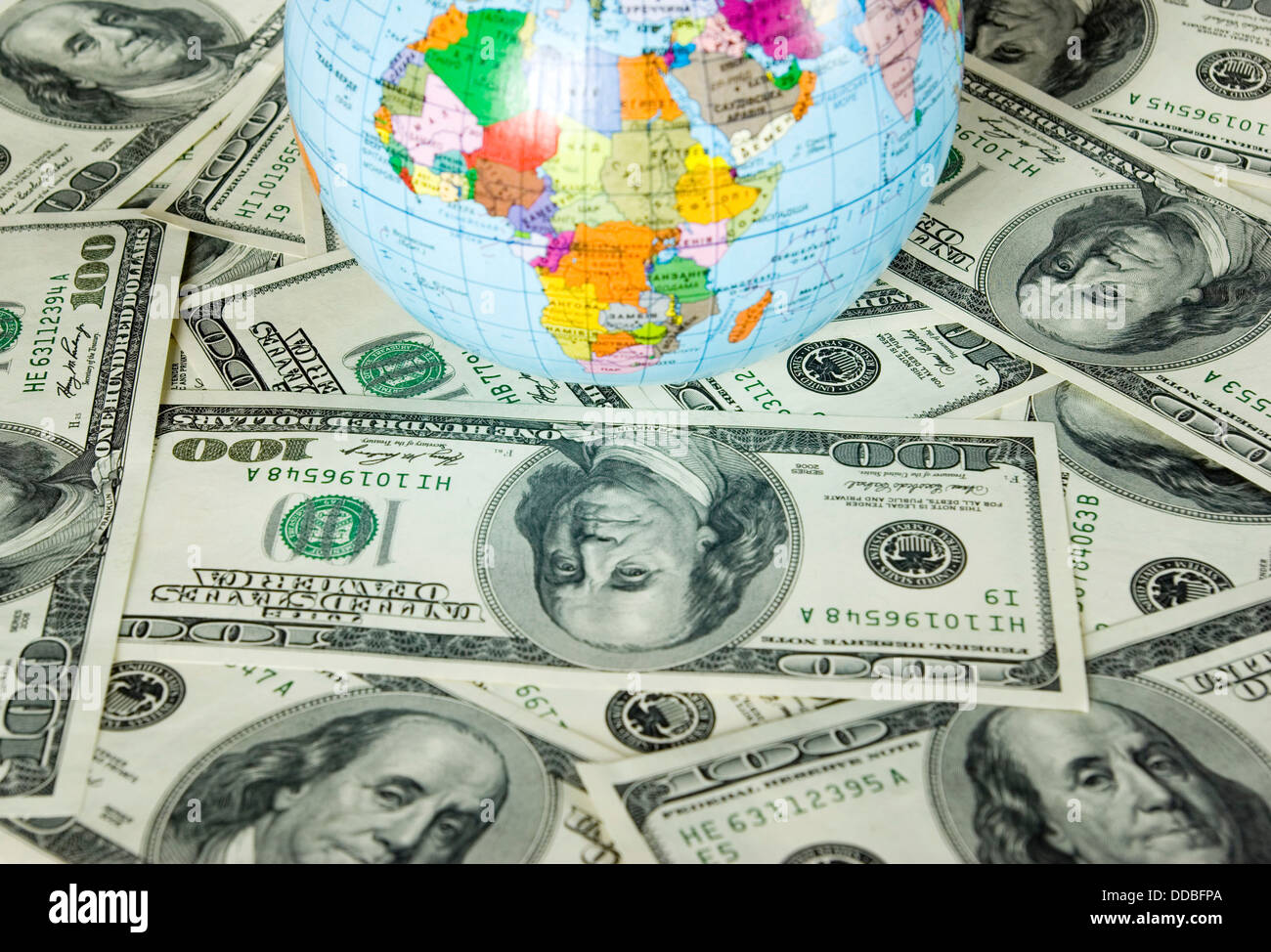 globe and dollars Stock Photo - Alamy