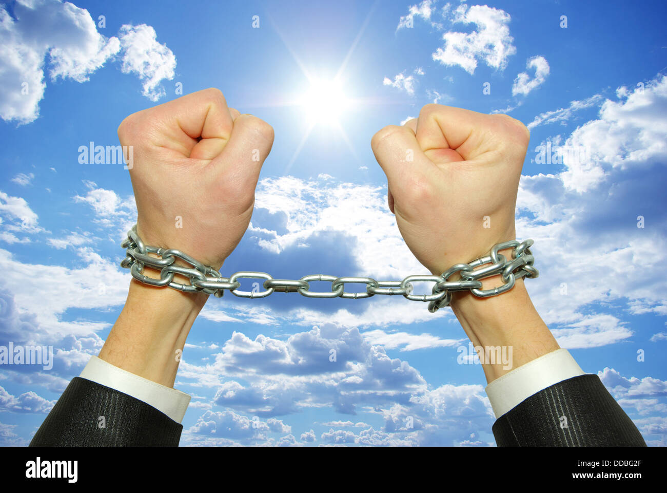 hands in chains Stock Photo - Alamy