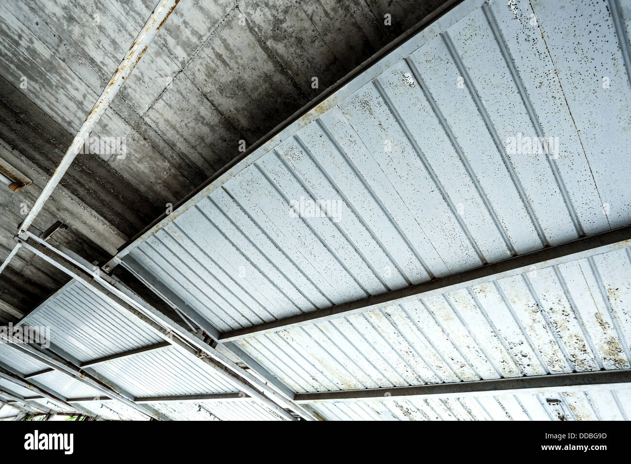 A industrial garage ceiling with open gates Stock Photo - Alamy