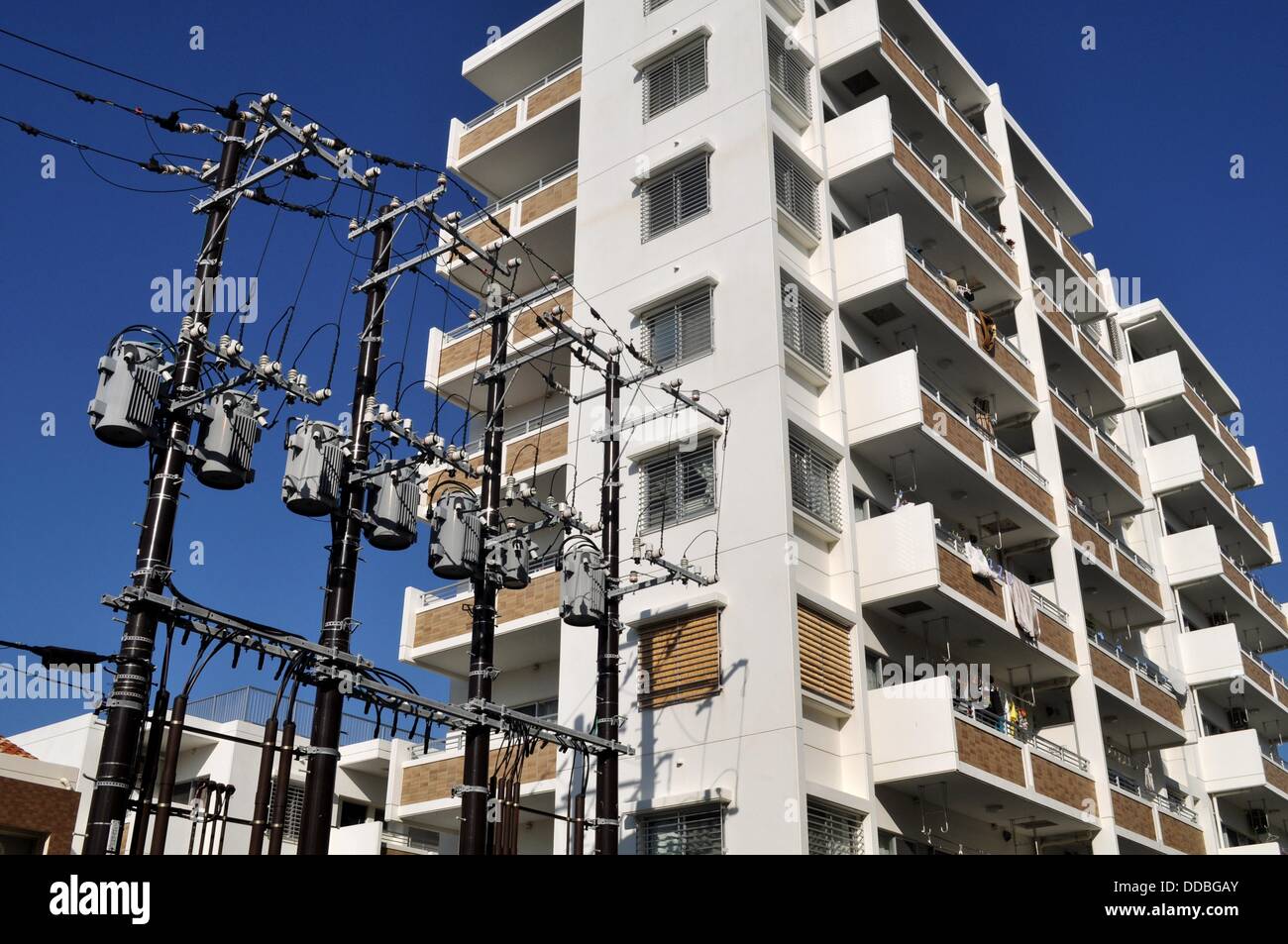Naha Japan: electricity poles by a condo Stock Photo - Alamy