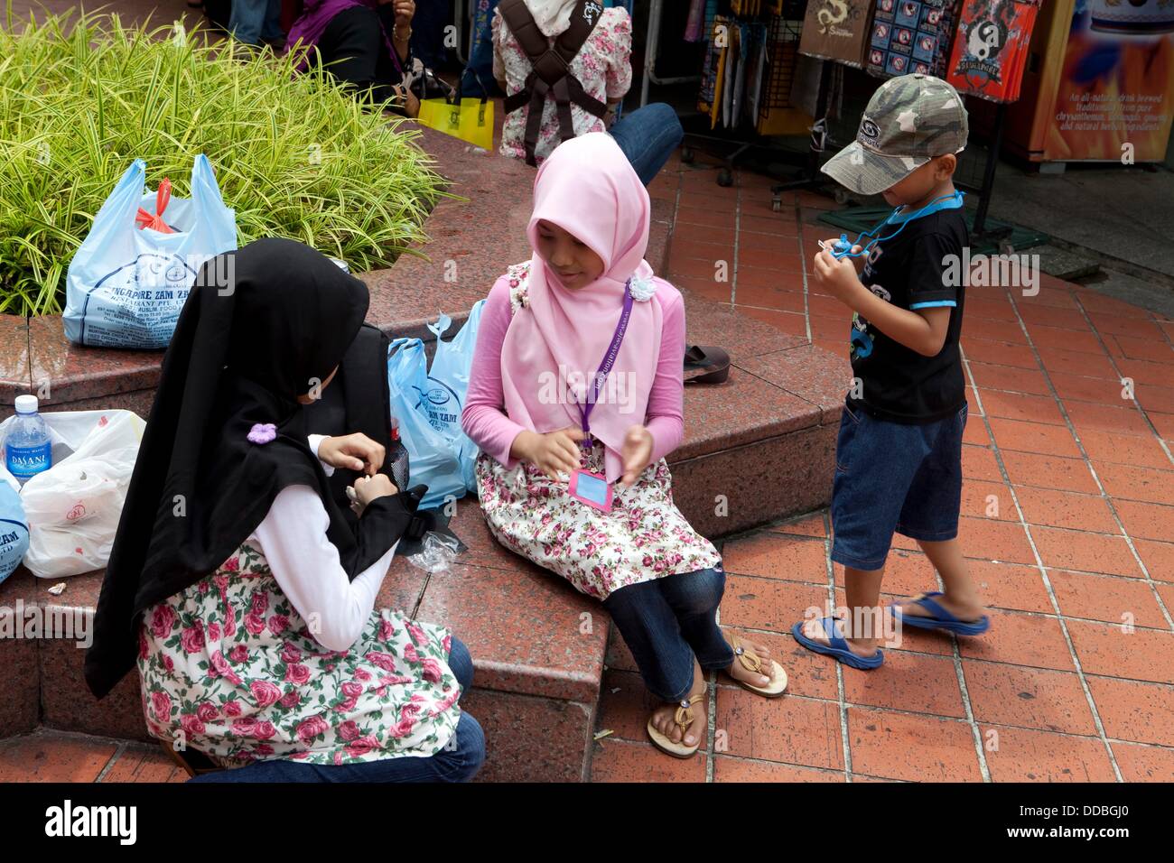 Muslim children playing on arab street hi-res stock photography and ...