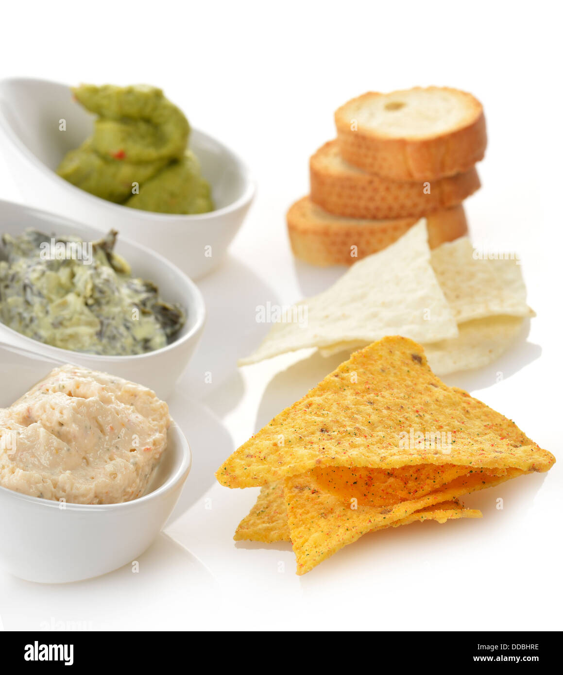 Dips With Chips And Toasts Stock Photo - Alamy