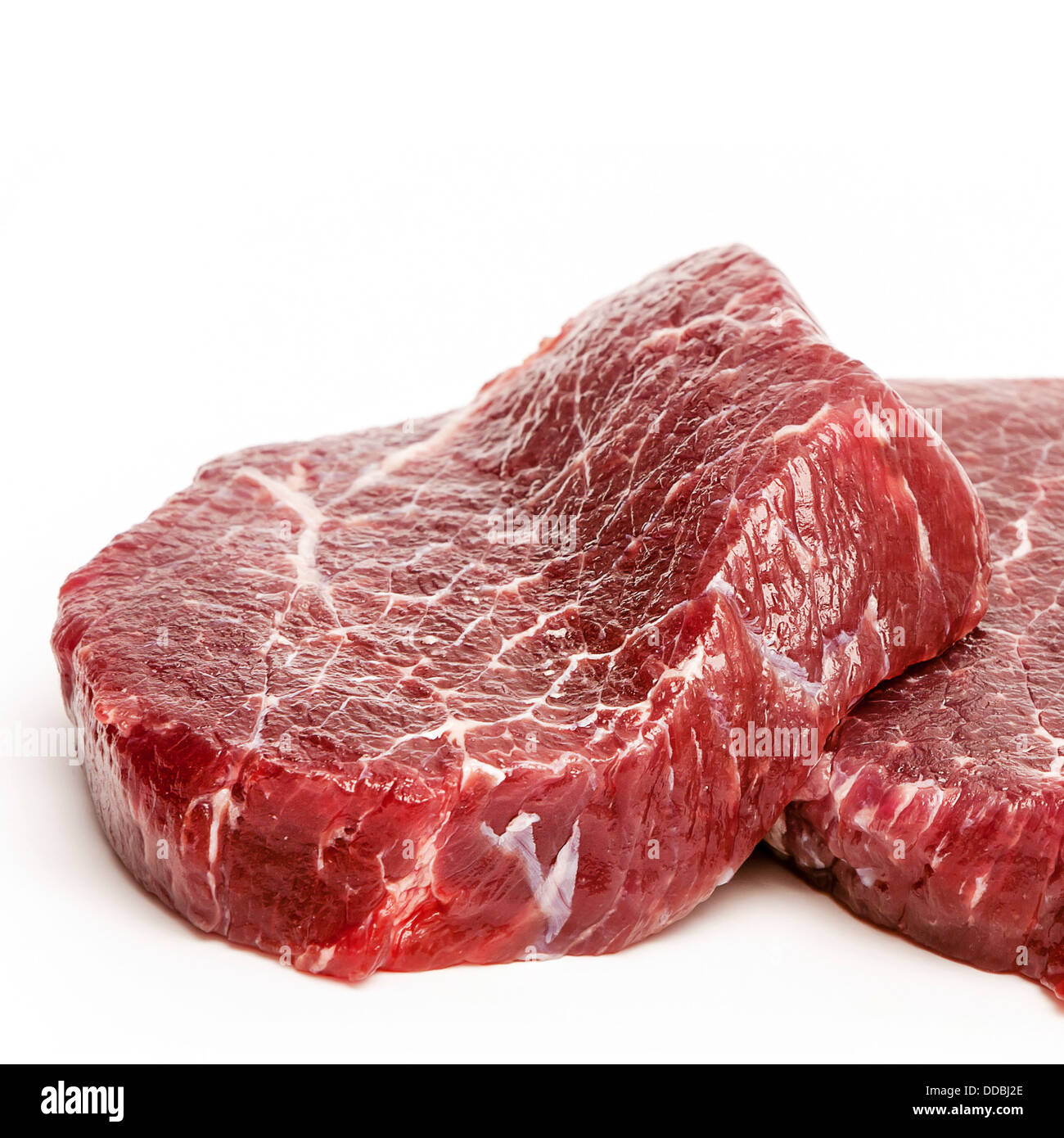 Raw fresh beef on white background Stock Photo - Alamy