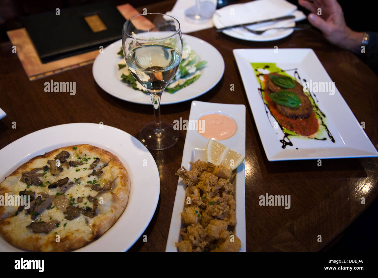 A tasty appetizer menu is served at the bar at the Panzano Restaurant ...