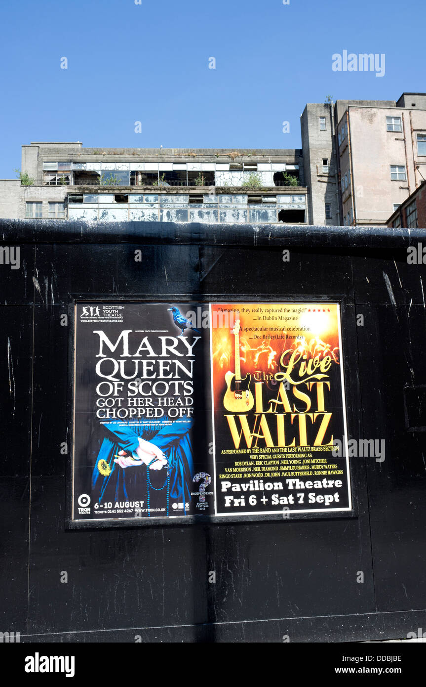 Glasgow city centre posters board with derelict buildings in the ...