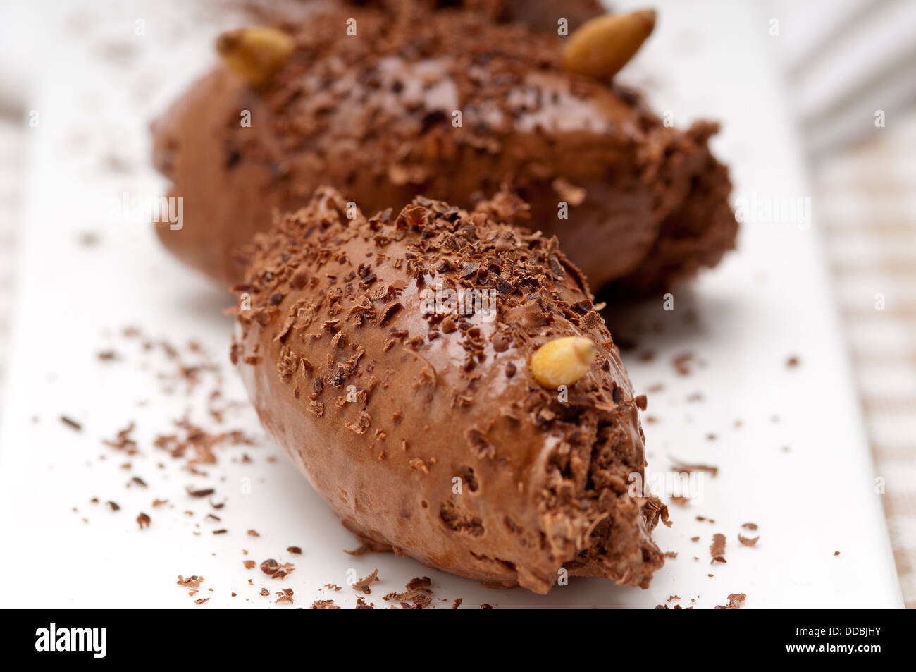 chocolate mousse quenelle dessert Stock Photo - Alamy