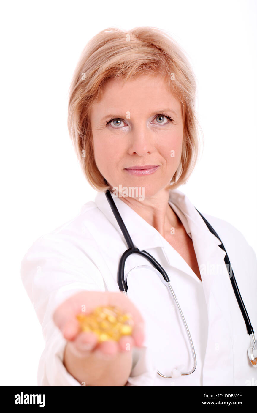 Female doctor holds pills hi-res stock photography and images - Alamy
