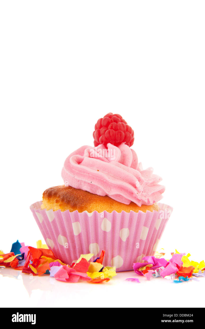 Pink cupcake with raspberry Stock Photo - Alamy
