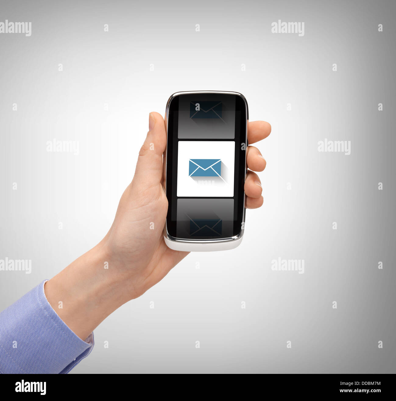 man with smartphone and message icon Stock Photo - Alamy