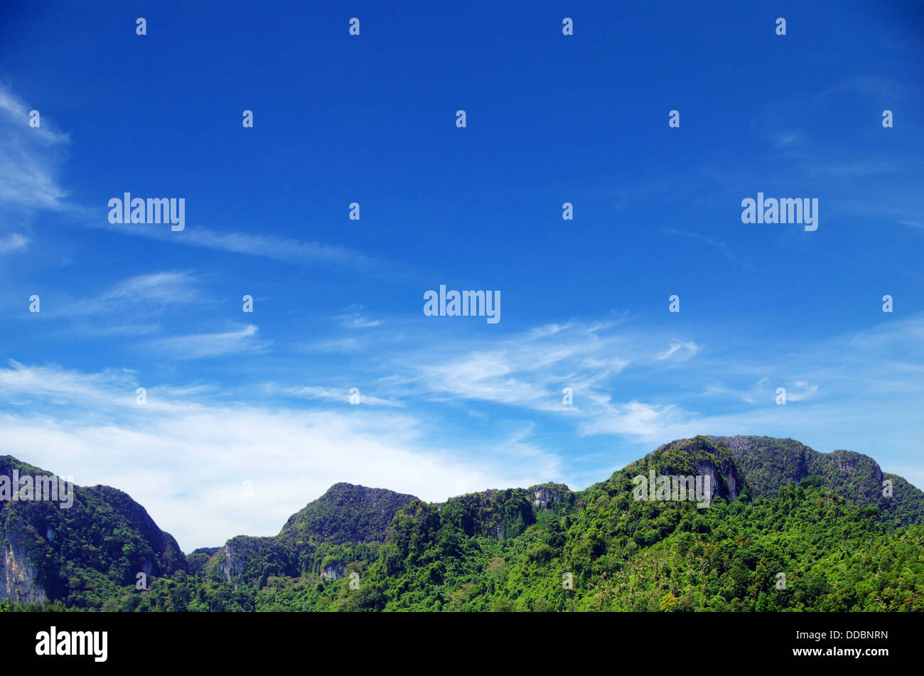 Tropical Mountain with blue sky Stock Photo - Alamy