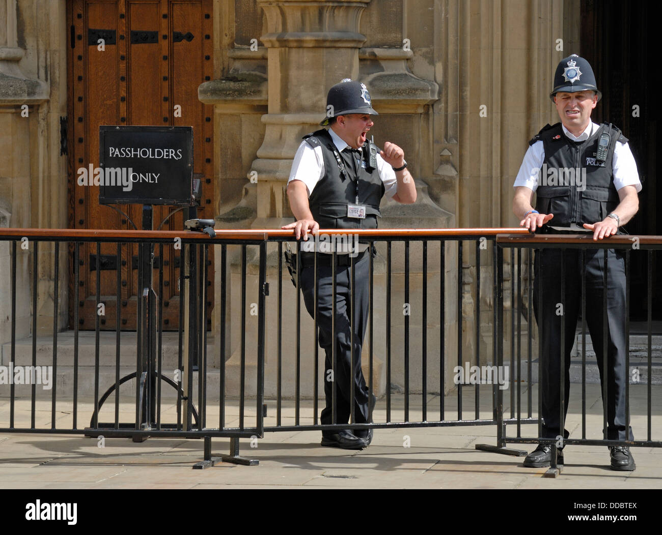 London, England, UK. Police officers on duty at the door of the Houses ...