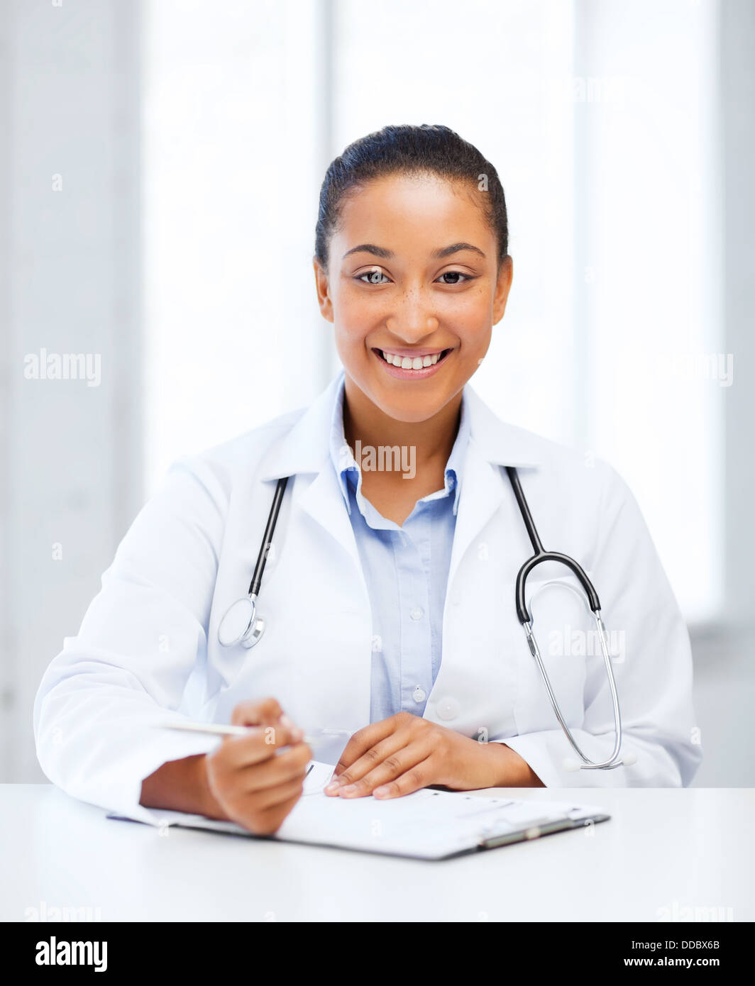 female doctor writing prescription Stock Photo - Alamy