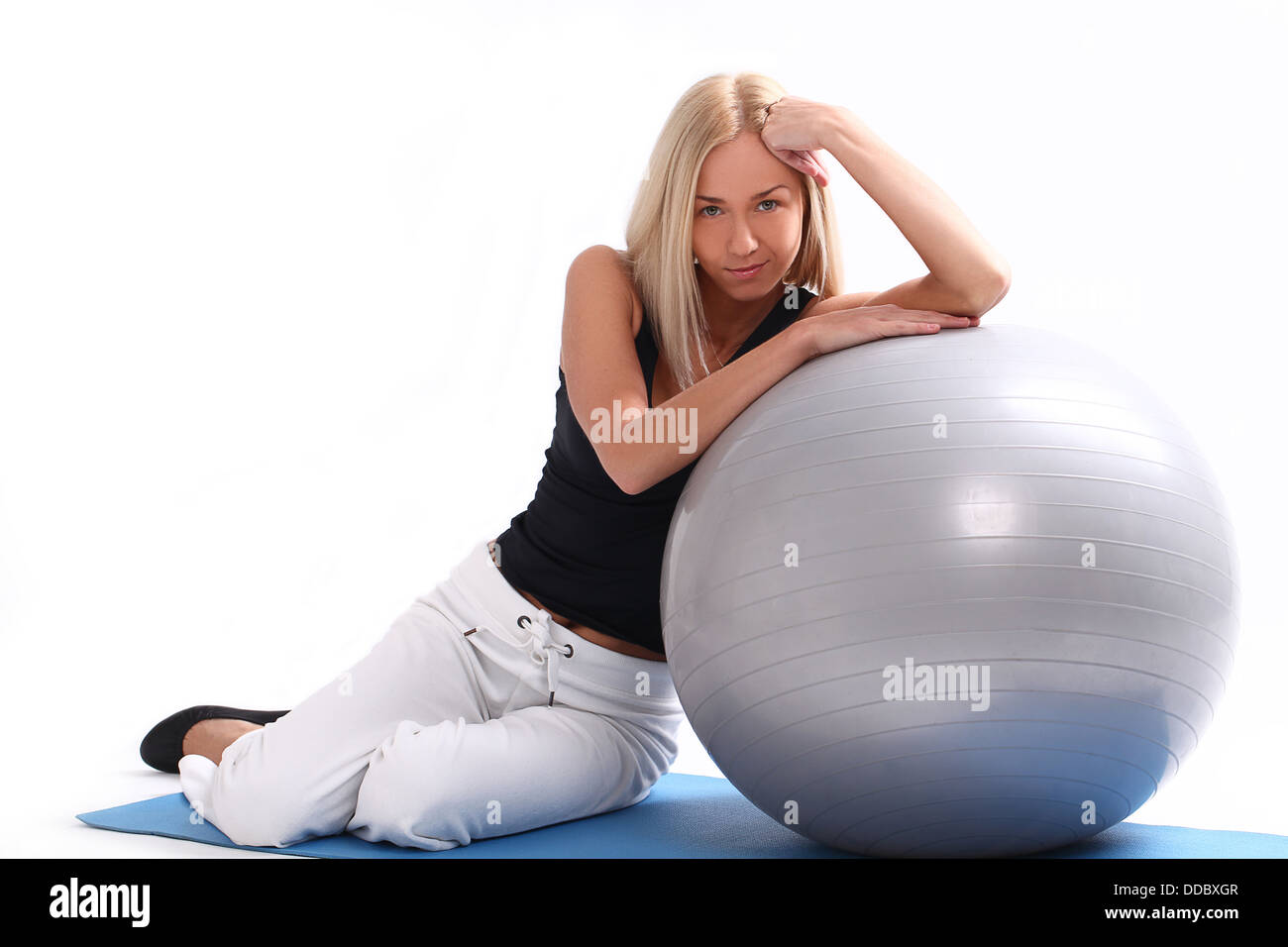 Happy and beautiful woman with fitness ball Stock Photo - Alamy