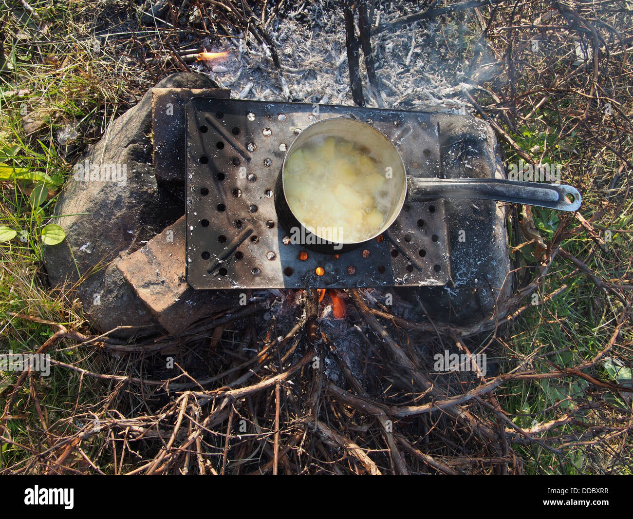 casserole with potatoes on the fire Stock Photo - Alamy