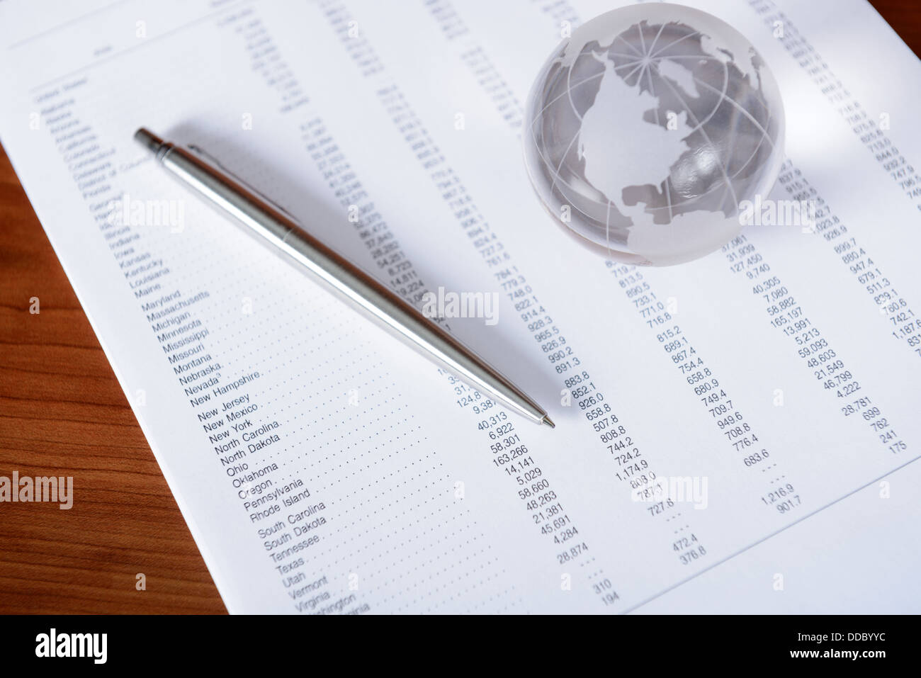 Business Papers With Glass Globe Stock Photo - Alamy