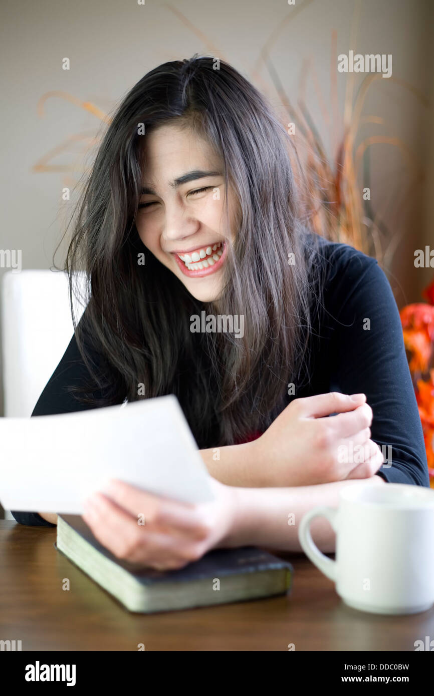 Asian girl reading bible in hi-res stock photography and images - Alamy