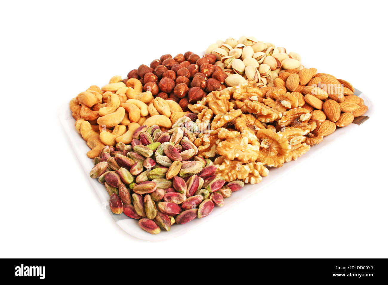 Different nuts isolated on white background Stock Photo - Alamy