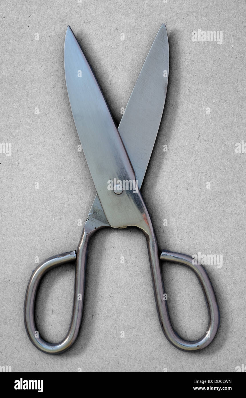 A pair of old handle scissors open. over gray background Stock Photo ...