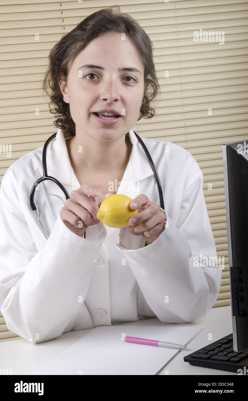 medical personnel explains the importance a lemon Stock Photo - Alamy