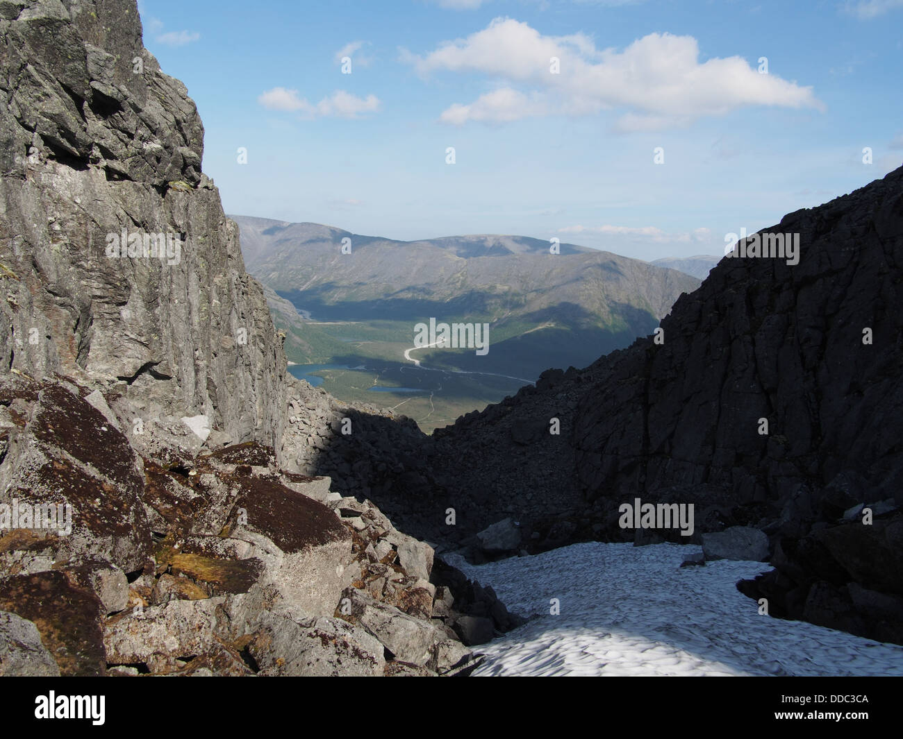 Snow in the mountains in summer Stock Photo - Alamy